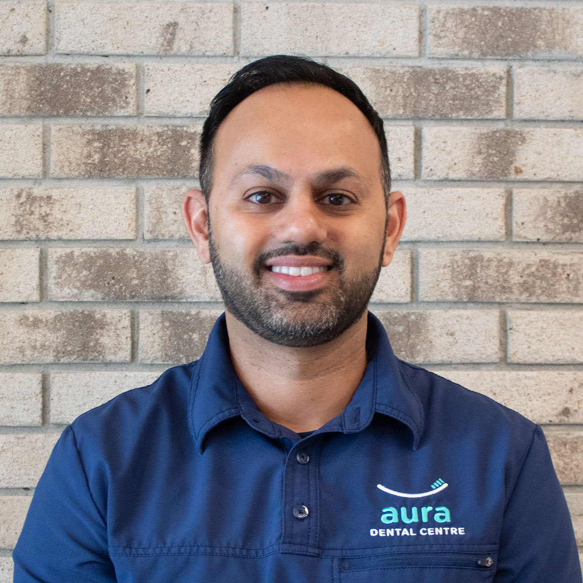 Dr. Amrit Bains - Aura Dental Centre